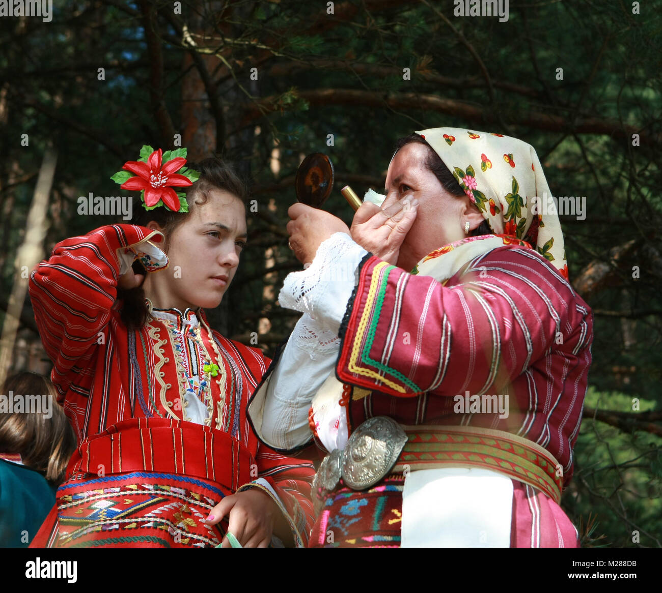 People in traditional folk costume of The National Folklore Fair in ...