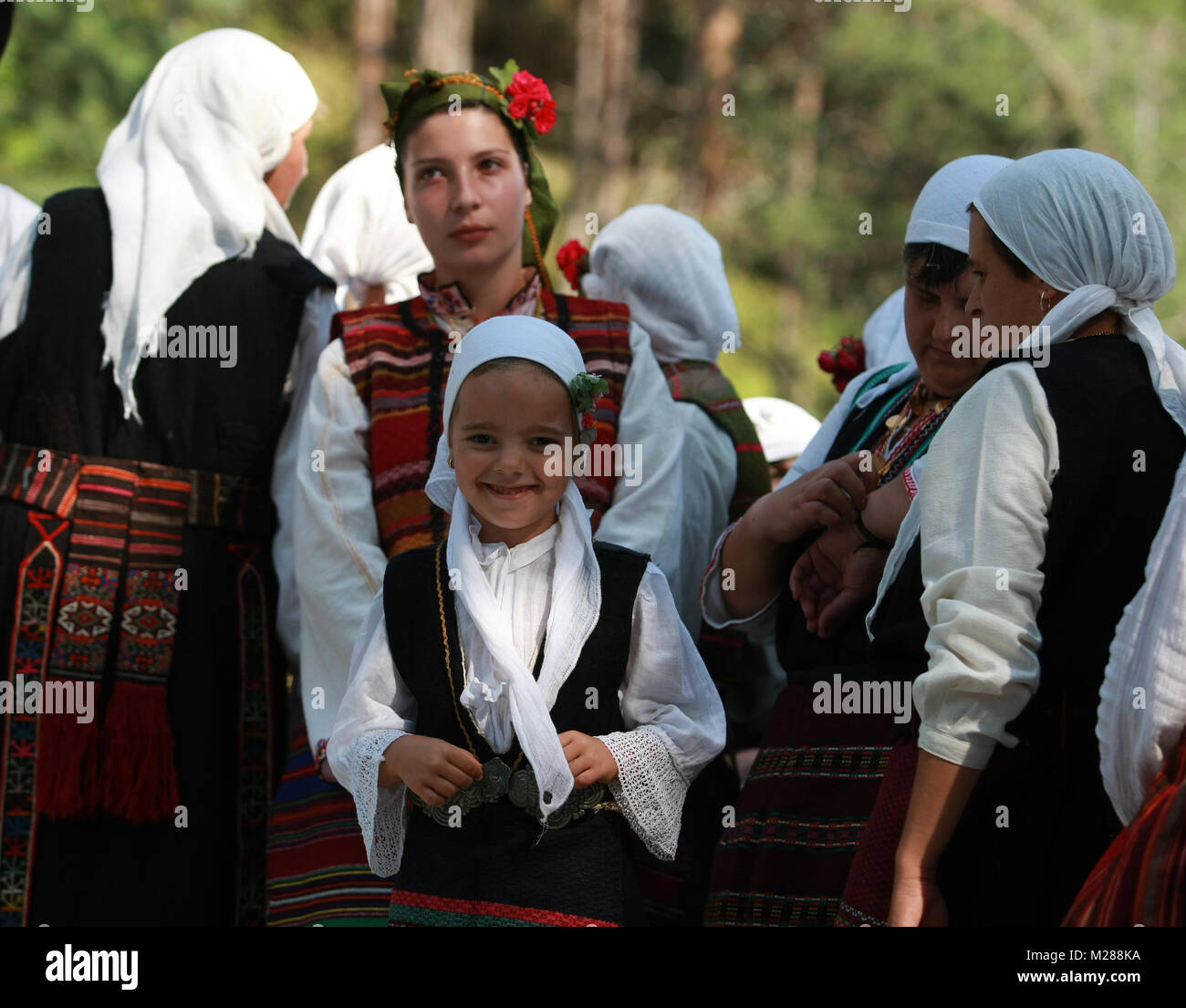 People in traditional folk costume of The National Folklore Fair in ...