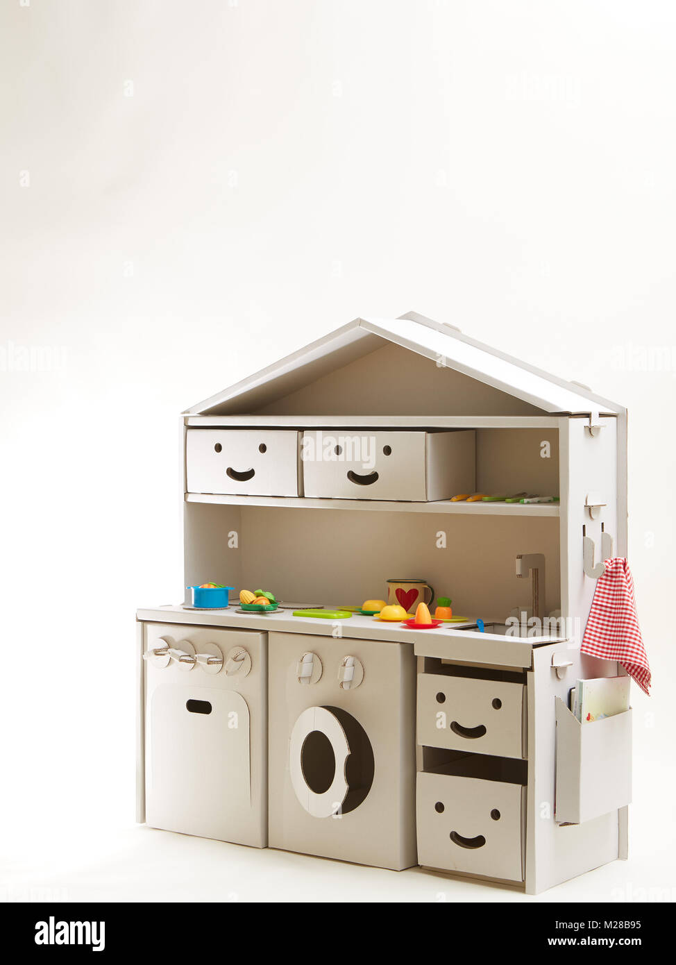 Child cardboard toy kitchen Stock Photo - Alamy