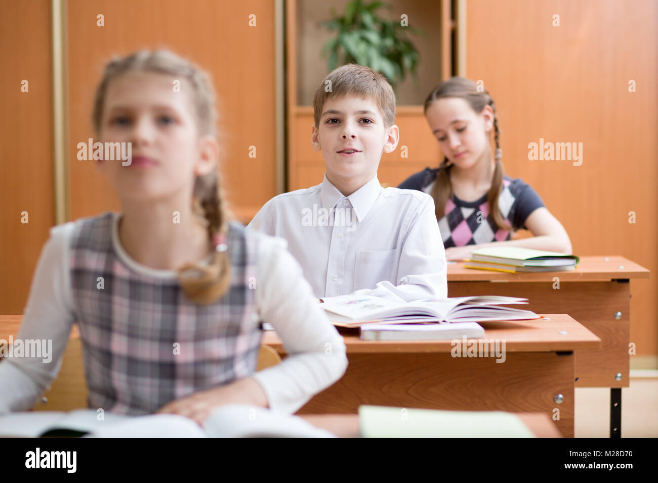 education, elementary school, learning and people concept - group of ...