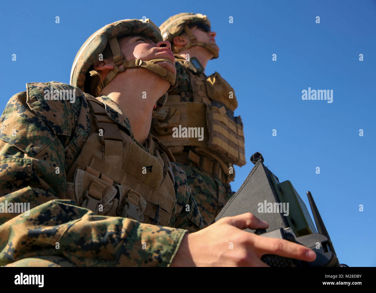 Marines supervise unmanned aerial systems as they pilot them over ...