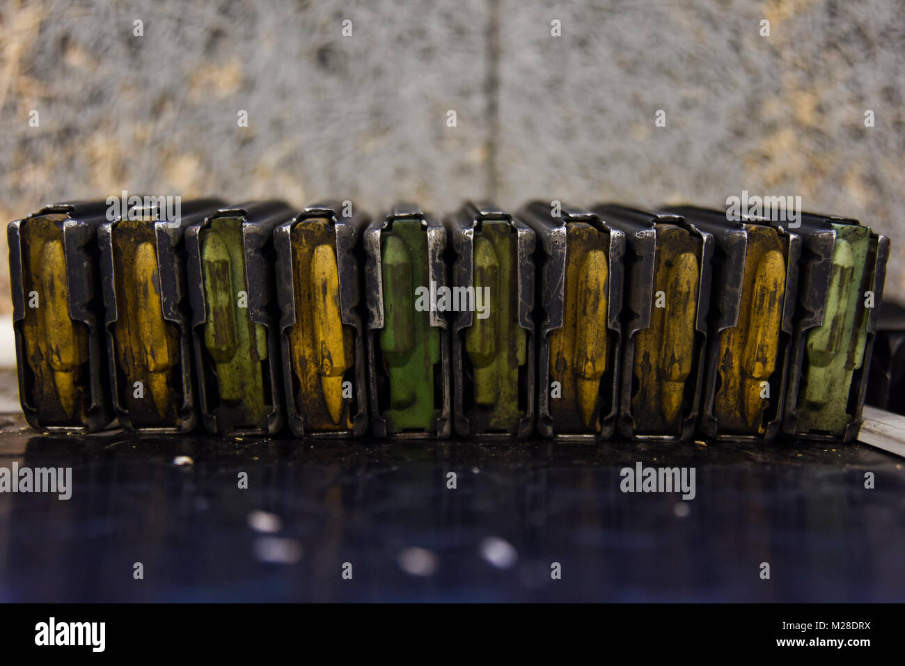 Empty magazine cartridges are shown in the combat arms training and ...