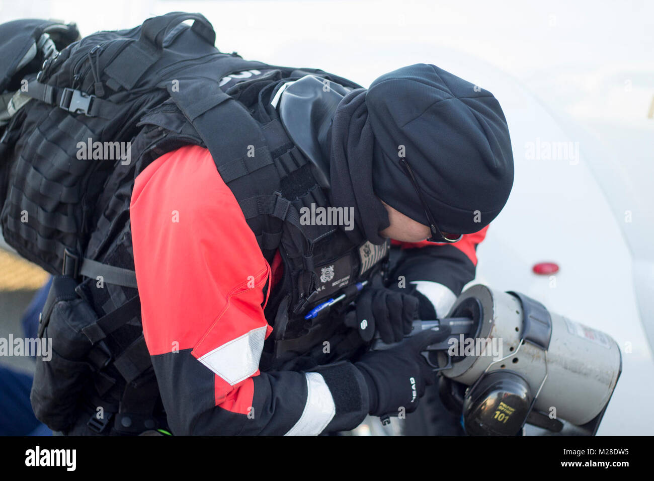 A Coast Guard member from Maritime Safety and Security Team New York ...