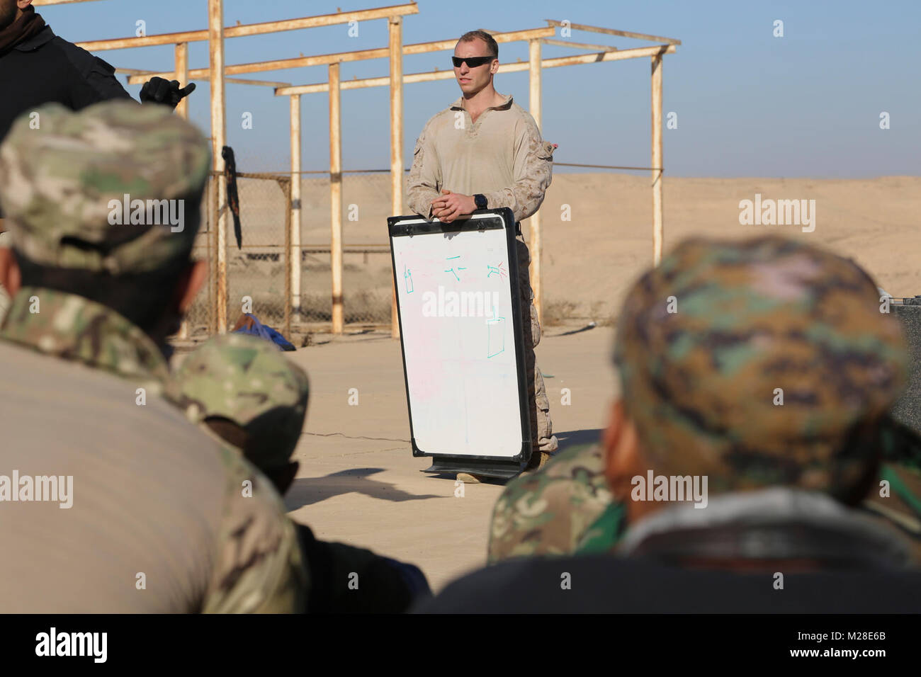A U.S. Marine Corps Explosive Ordnance Disposal technician, deployed in ...