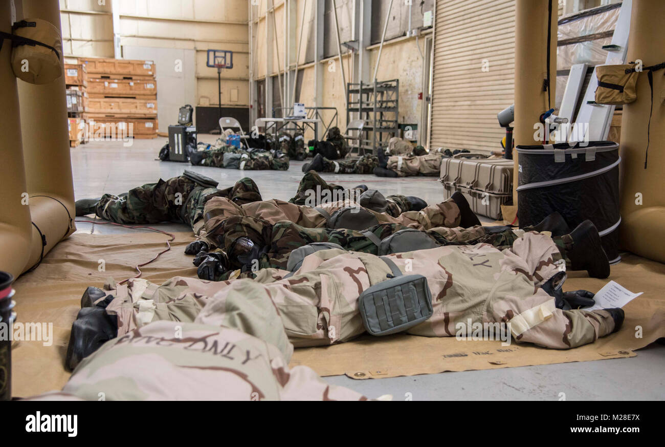 Airmen from the 60th Maintenance Group and 60th Operations Group lay on ...
