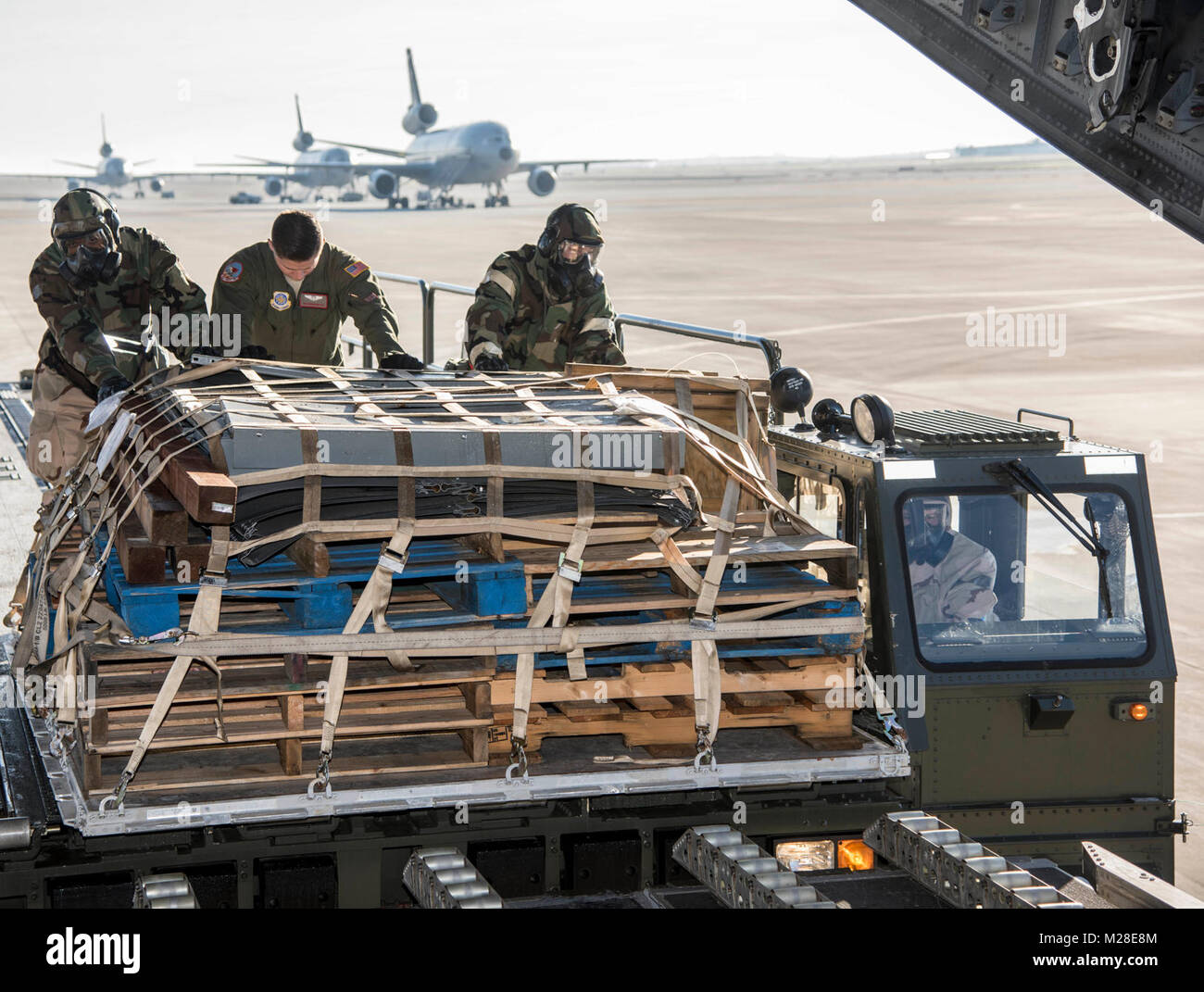 Airmen from the 60th Aerial Port Squadron and 21st Airlift Squadron ...