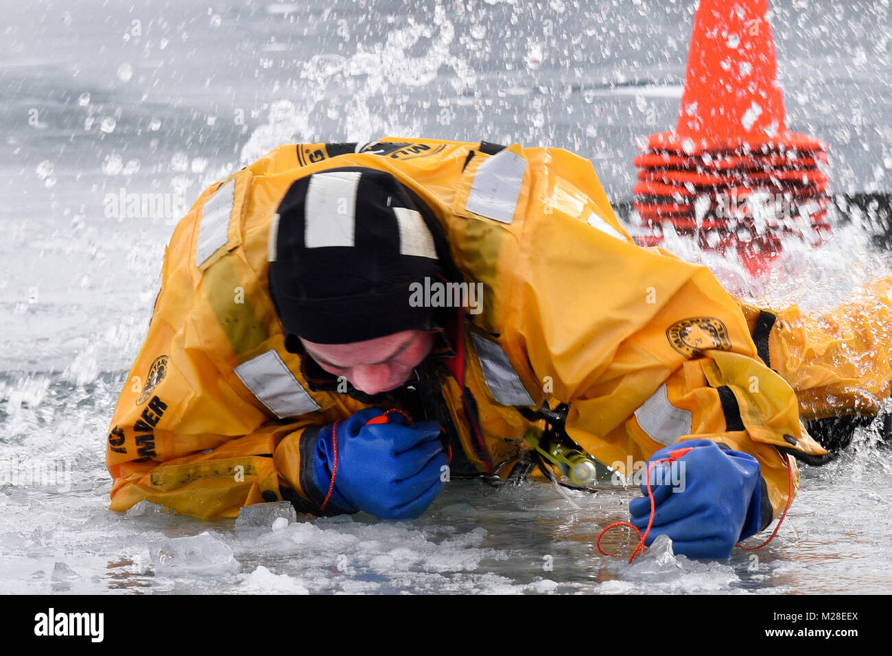 A firefighter with the 127th Civil Engineering Squadron, assigned to ...