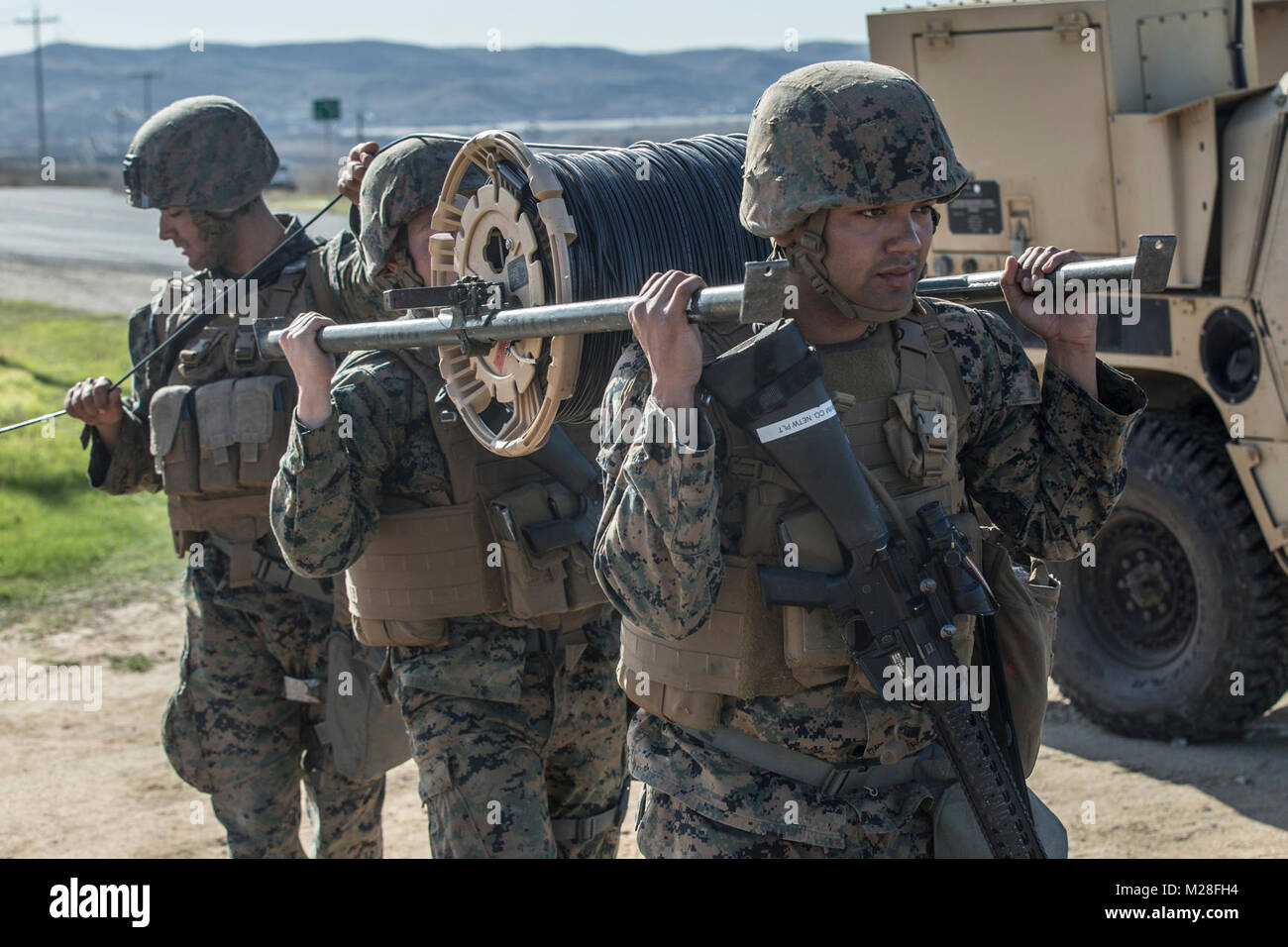 U.S. Marine Corps Pfc. Brian Dominguez, a Data Networks Technician ...