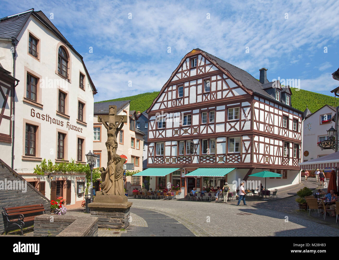 Old town, pedestrian area, crucifix and half-timbered house, Bernkastel ...