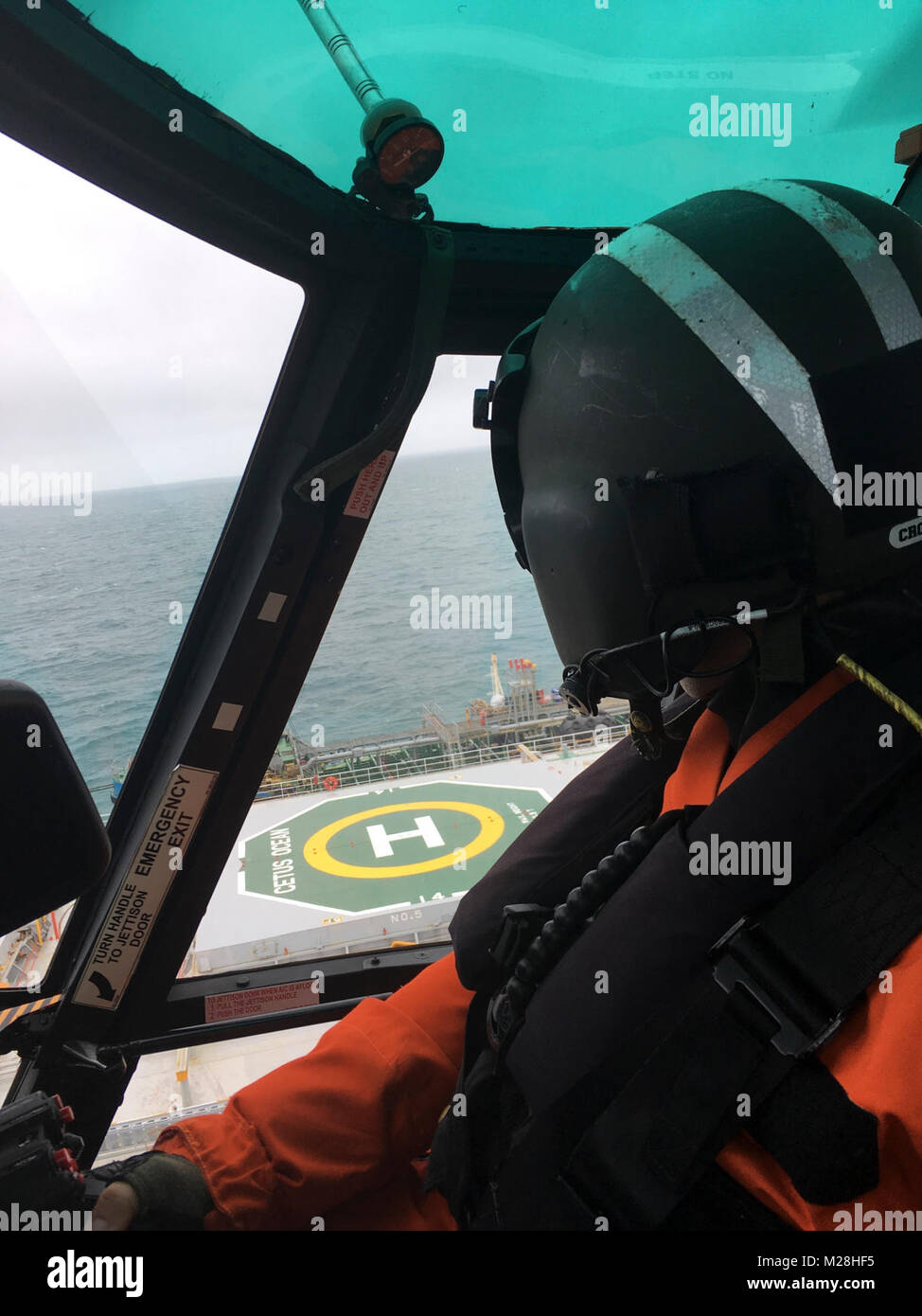 An Air Station Houston MH-65 Dolphin helicopter pilot surveys the 336 ...