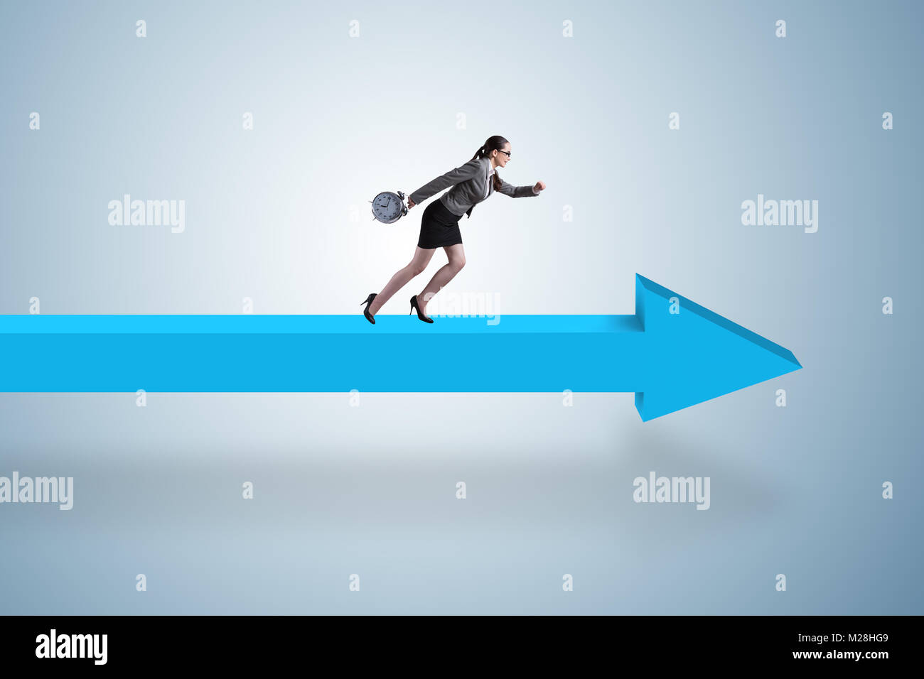 Businesswoman walking on arrow sign Stock Photo - Alamy