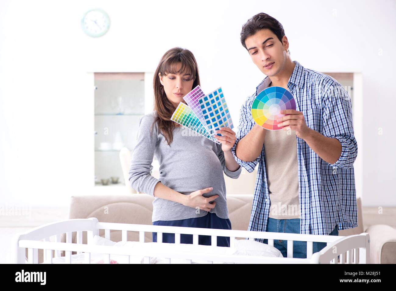 Young parents expecting their first baby Stock Photo - Alamy