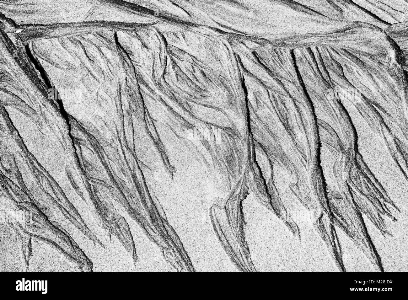 Pattern in sand, from beach in Ghana Stock Photo - Alamy