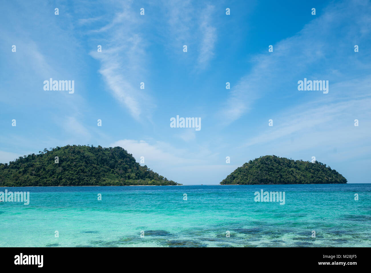 Sea island front view seascape sunny with tree around blue sky Stock ...