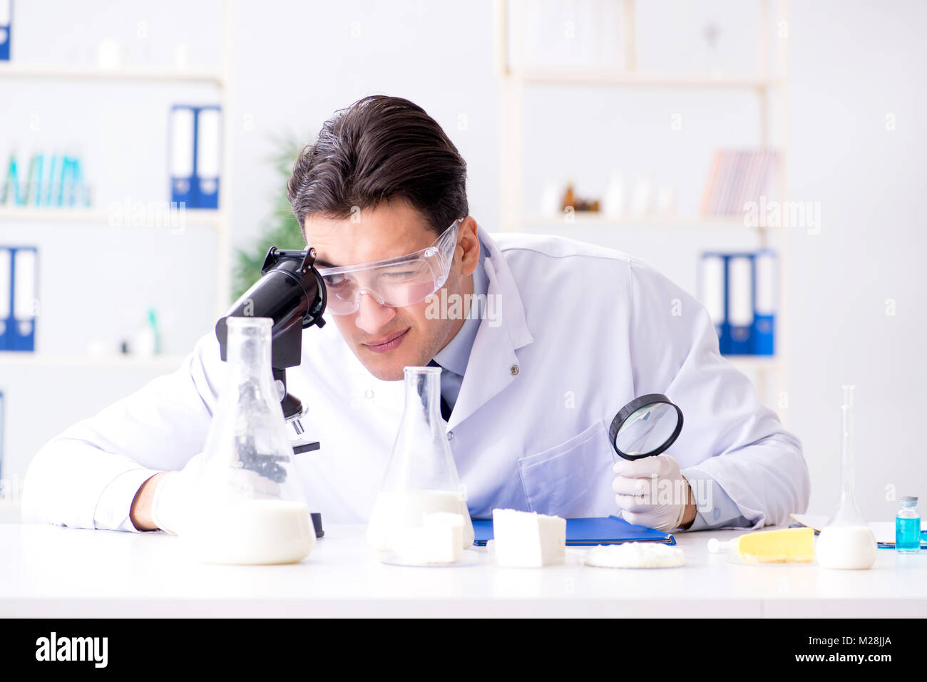 Food scientist testing new stuff in the lab Stock Photo - Alamy