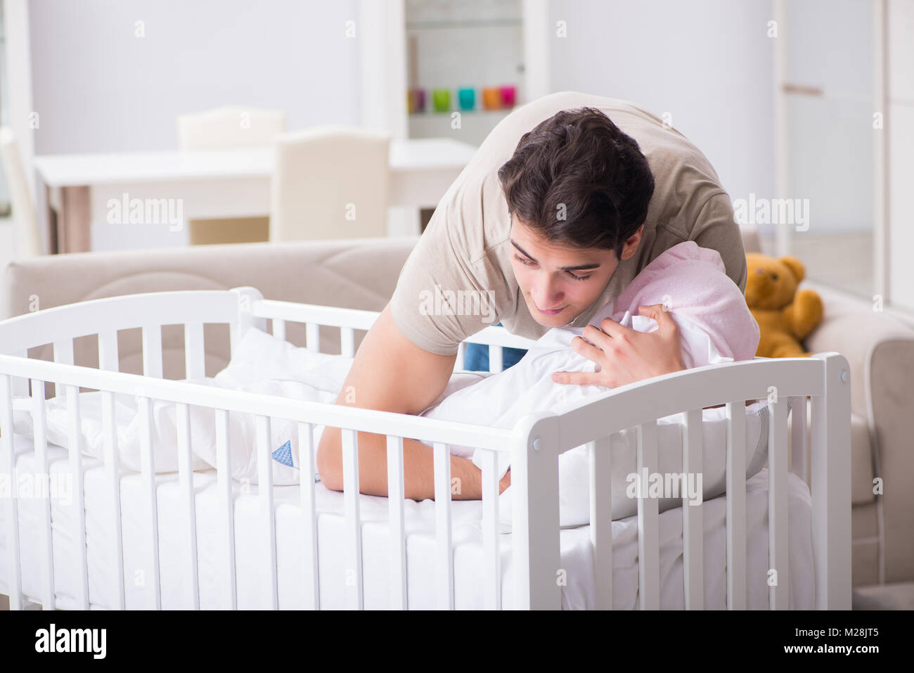 Stressed father crying baby hi-res stock photography and images - Alamy