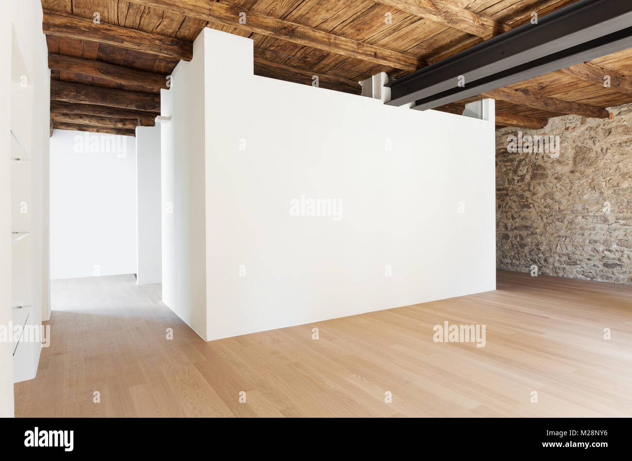 beautiful modern loft, empty room with stone walls Stock Photo - Alamy