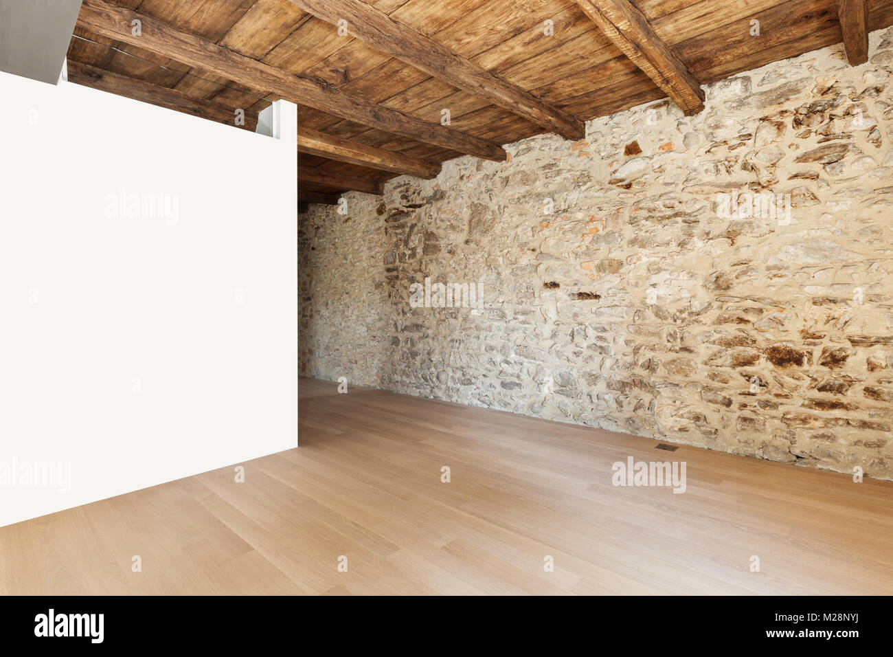 beautiful modern loft, empty room with stone walls Stock Photo - Alamy
