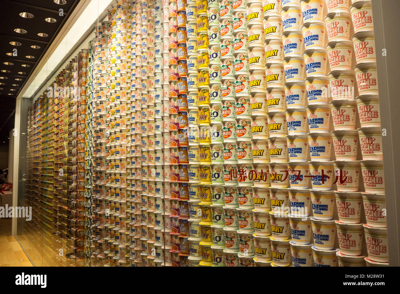 A wall showing some of Nissin's huge range of instant ramen products at ...