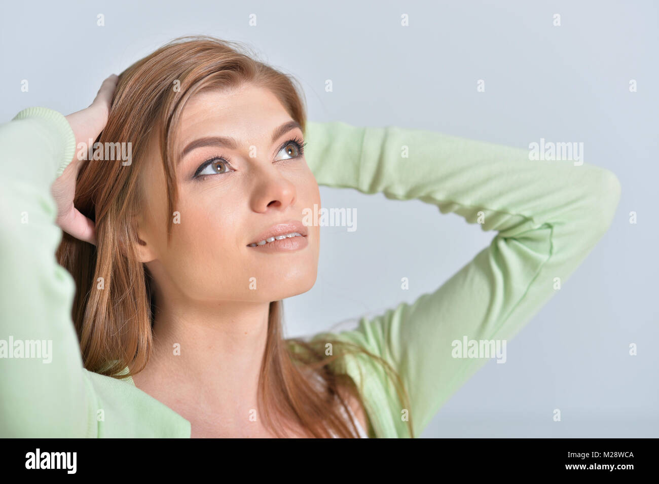 Portrait of a beautiful young woman close up Stock Photo - Alamy
