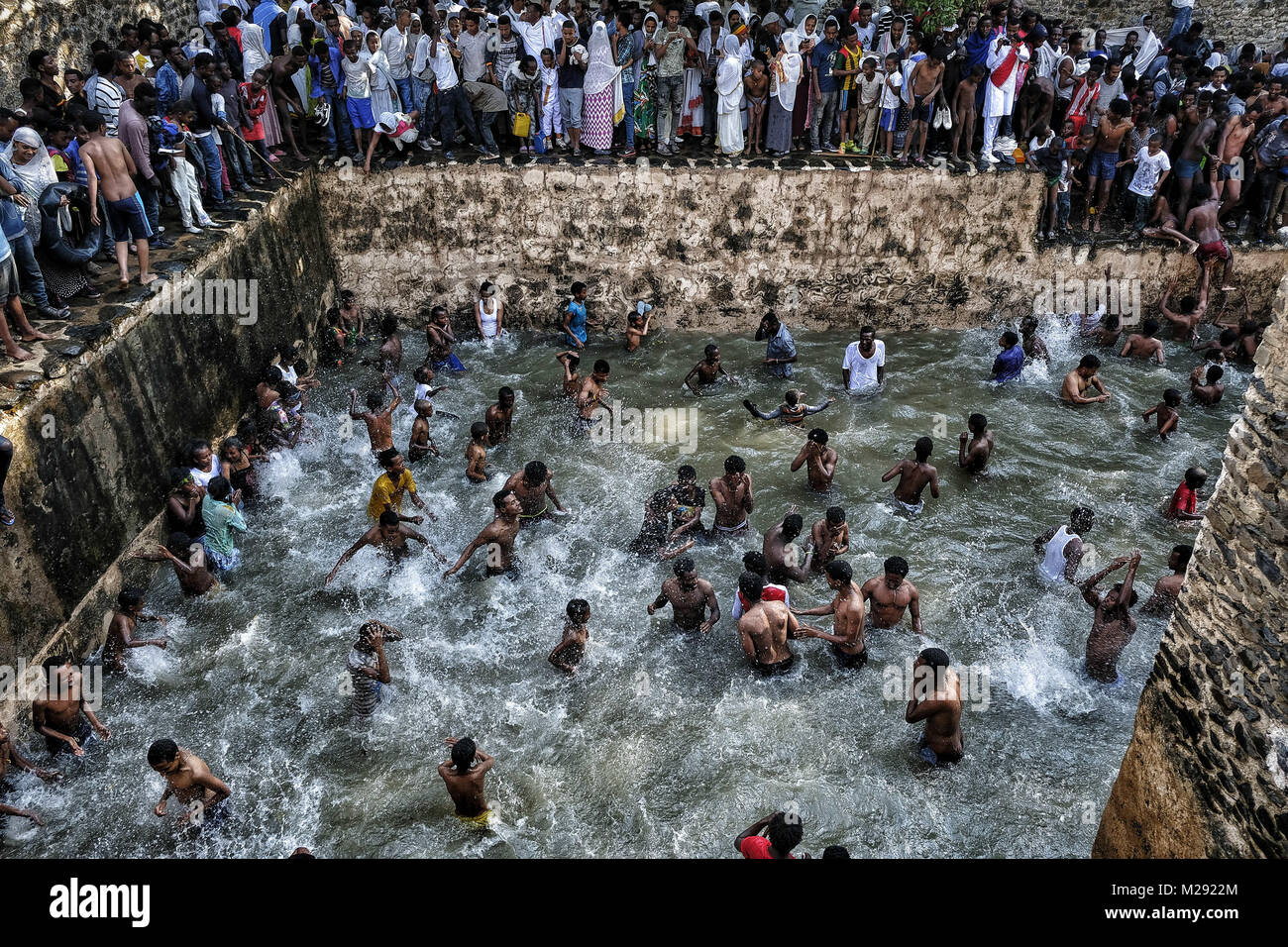 Pilgrims bathing in the river jordan hi-res stock photography and ...