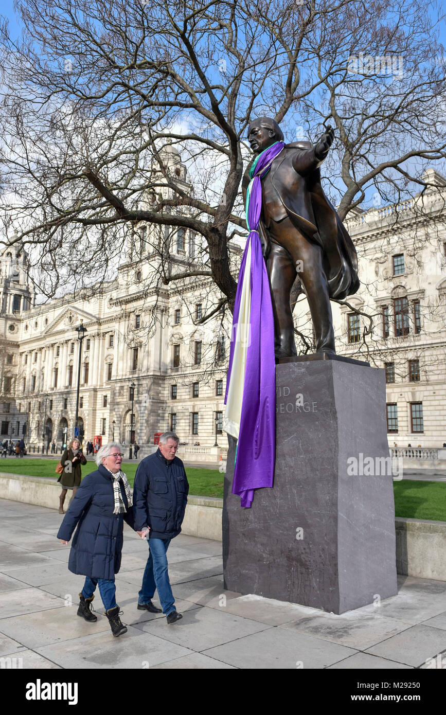 London, UK. 6 February 2018. A banner in the colours of the suffragette ...