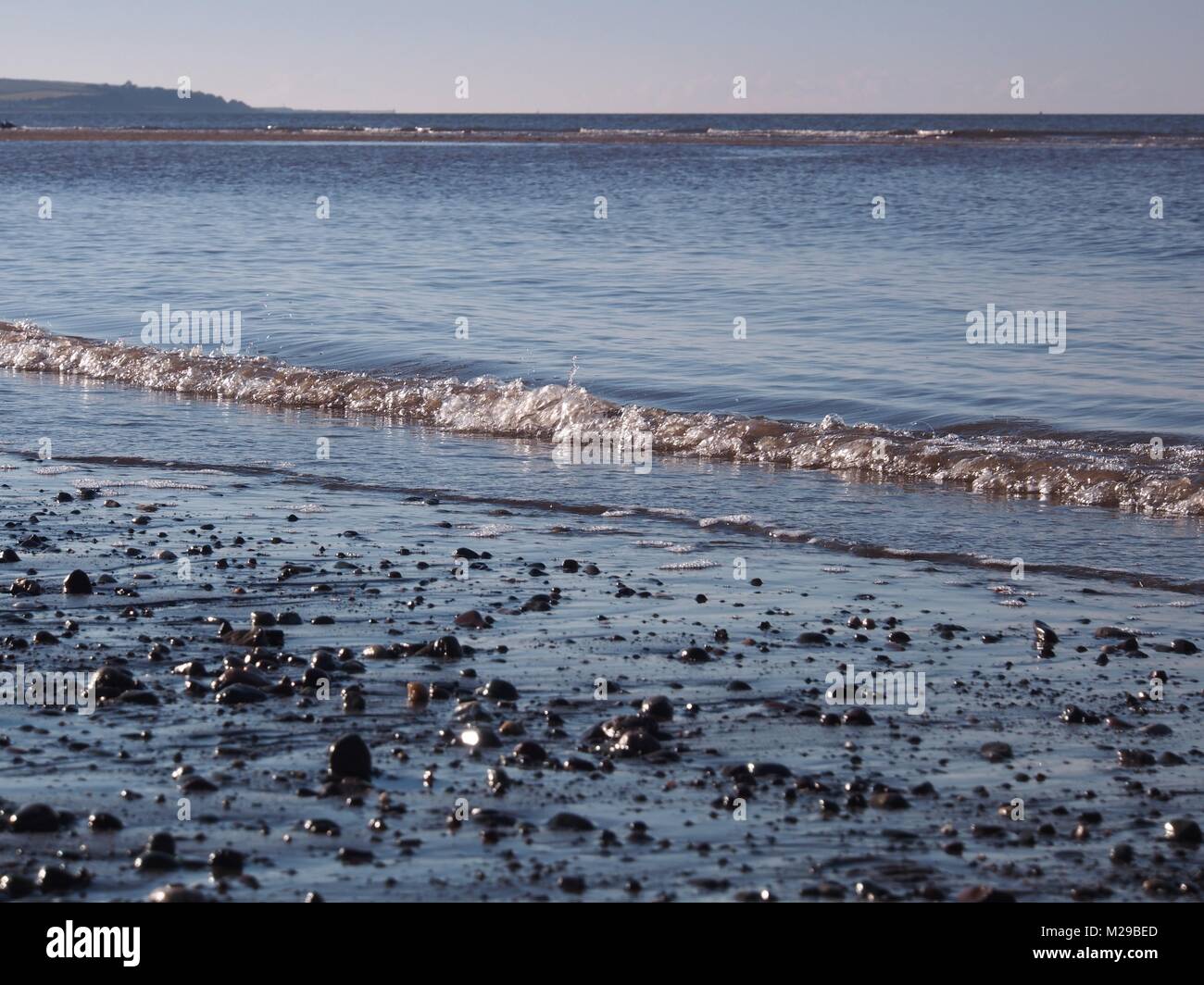 Gentle lapping of waves hi-res stock photography and images - Alamy