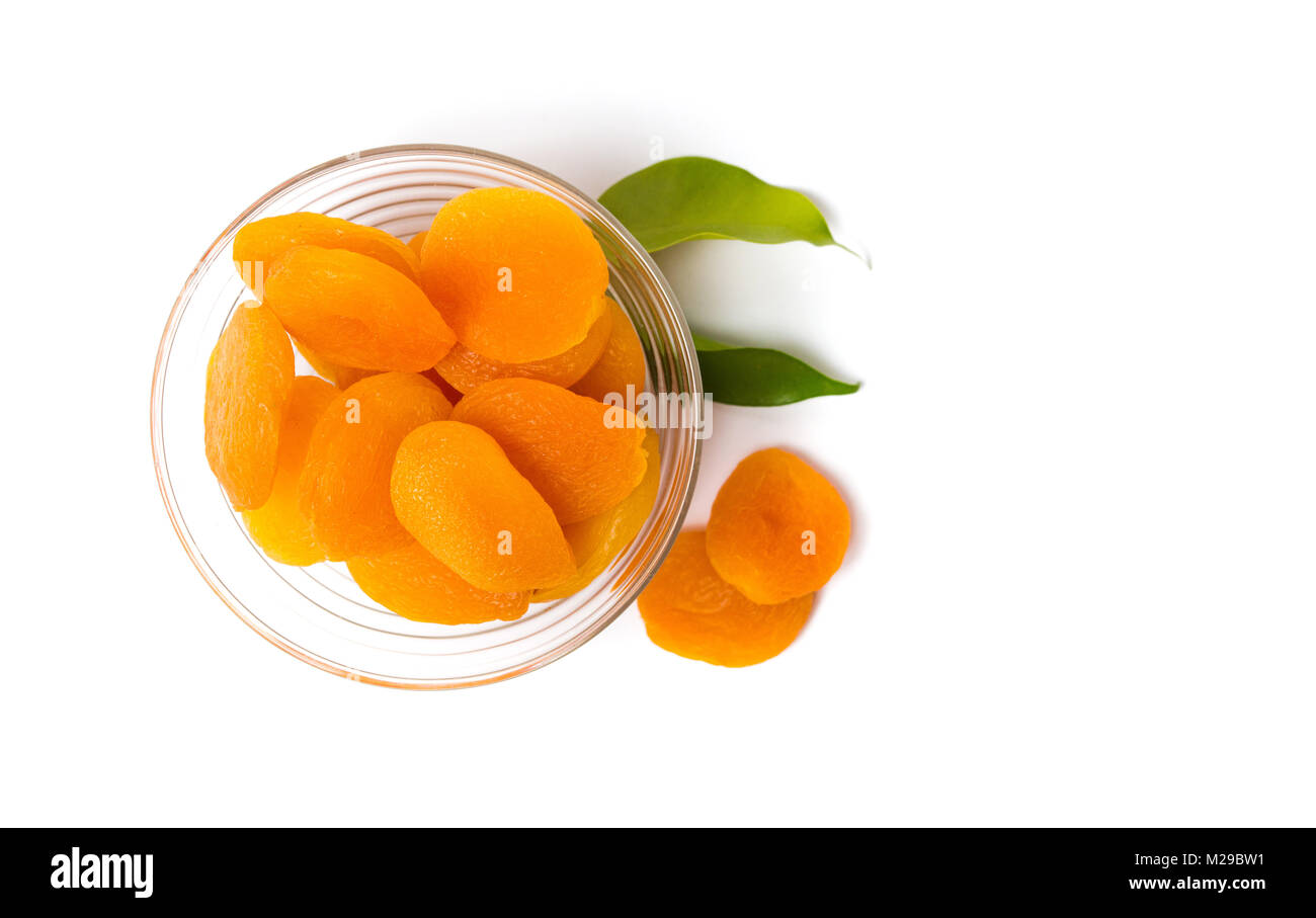 Dried apricot slices isolated on white background Stock Photo - Alamy