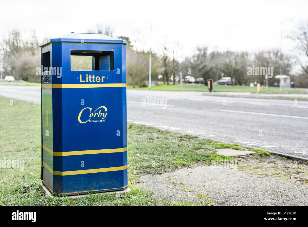 A blue coloured litter bin provided by Corby Borough Council at the ...