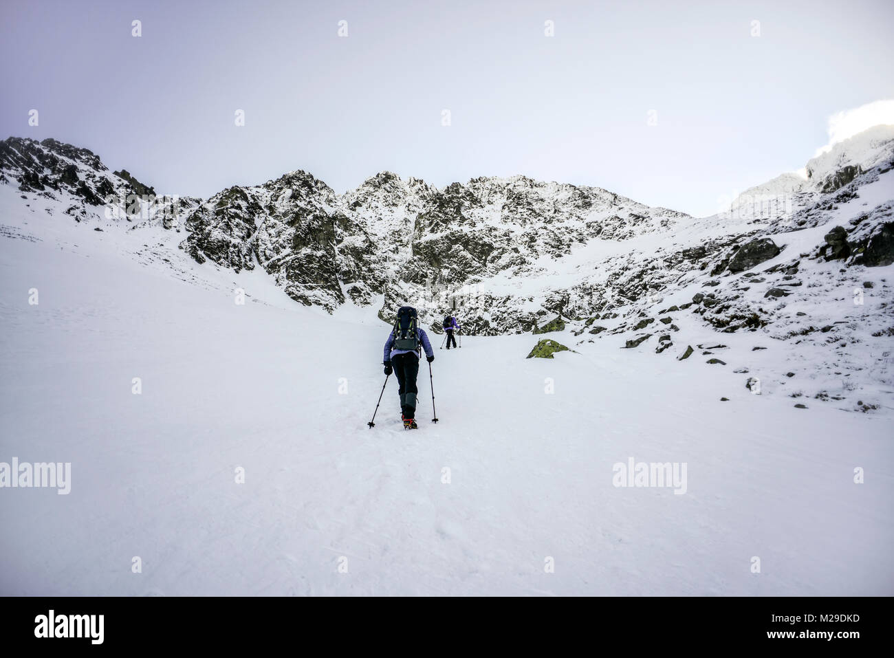 Man in mountains. Winter mountain landscape, Tatra mountains in Poland ...