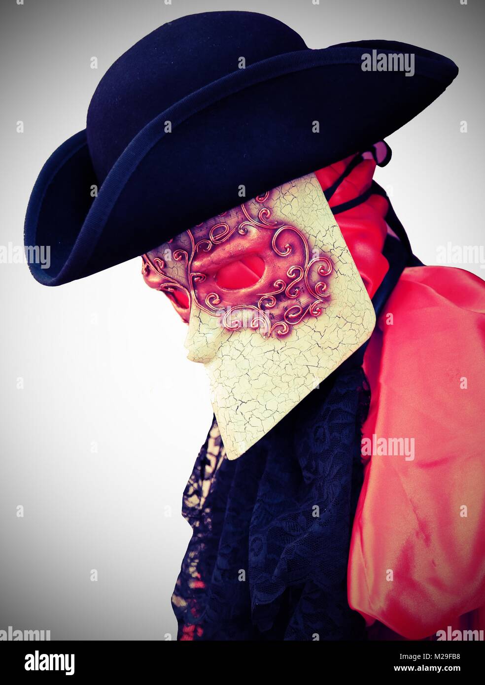 Venice carnival costume of an ancient Venetian nobleman with mask with ...