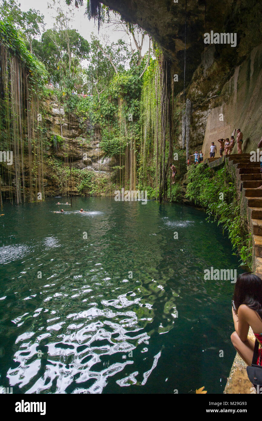 Tourists swimming in Ikil cenote on Yukatan peninsula in Mexico Stock ...