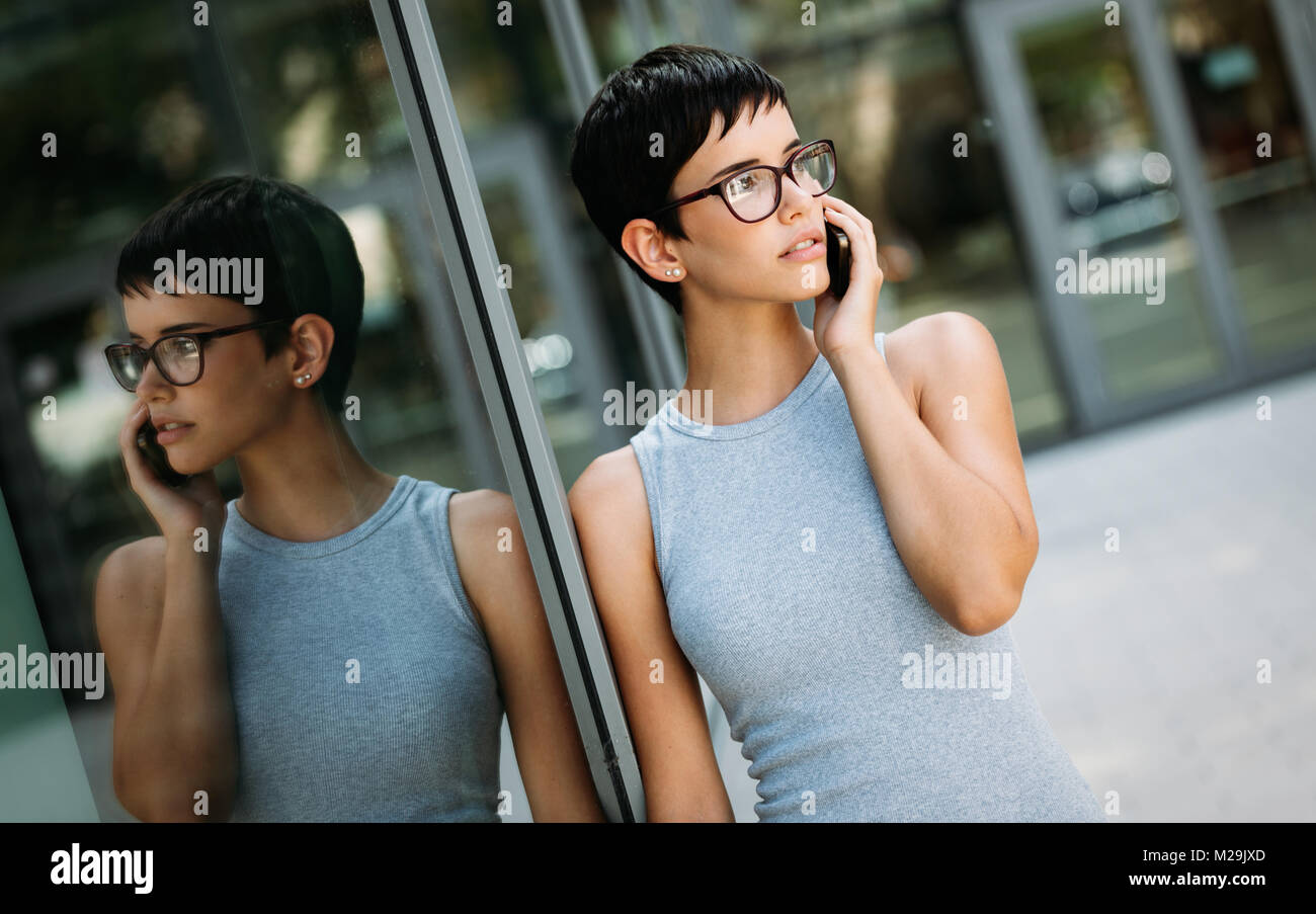 Company CEO busy talking on phone Stock Photo - Alamy