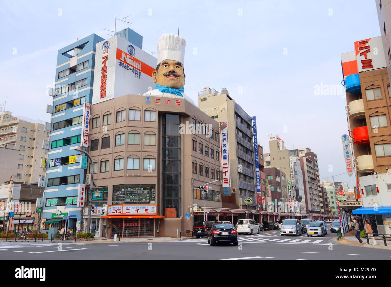 TOKYO, JAPAN - DECEMBER 4, 2016: People visit Kappabashi area of ...