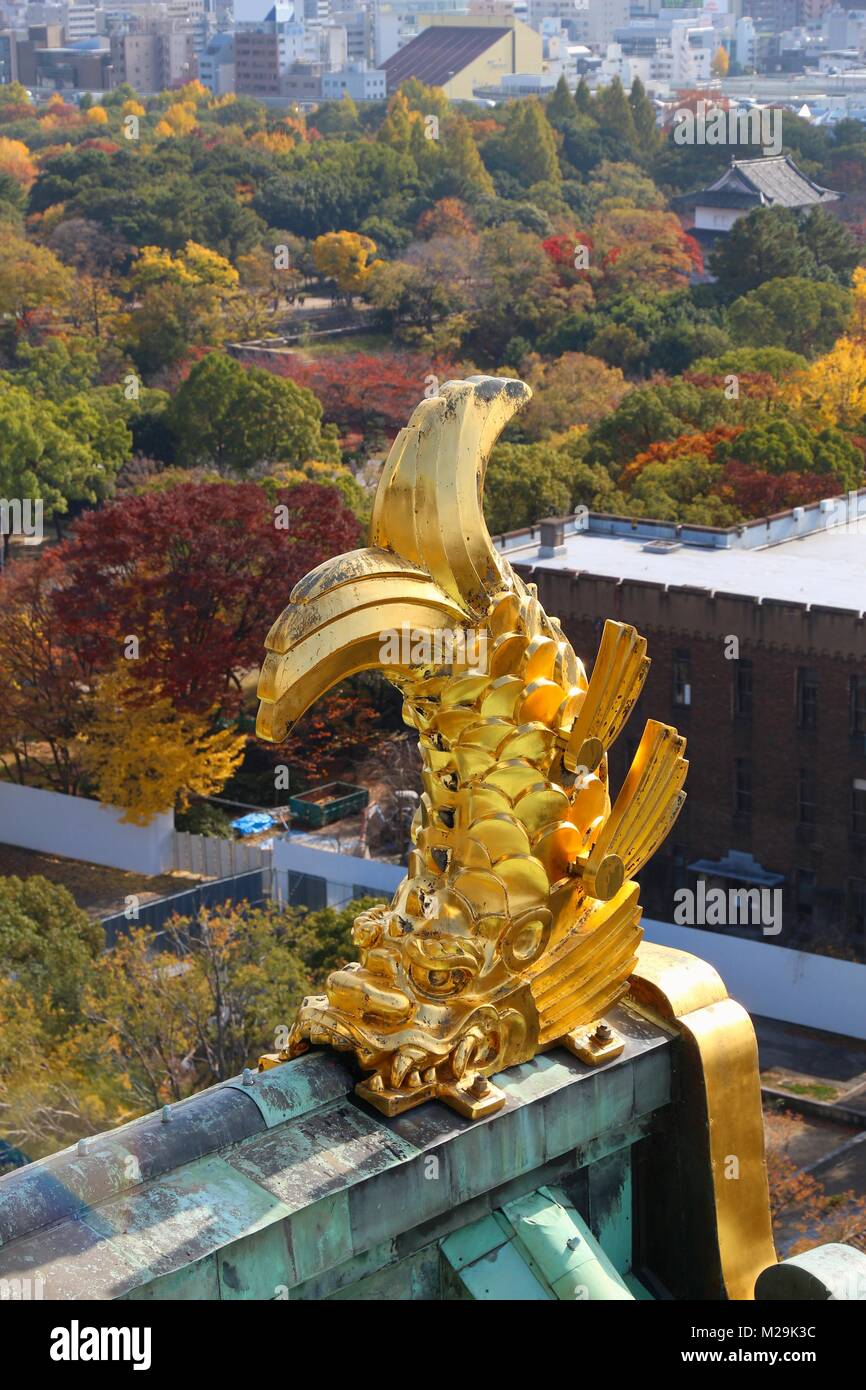 Osaka Castle - landmark of Japan. Gold fish sculpture Stock Photo - Alamy