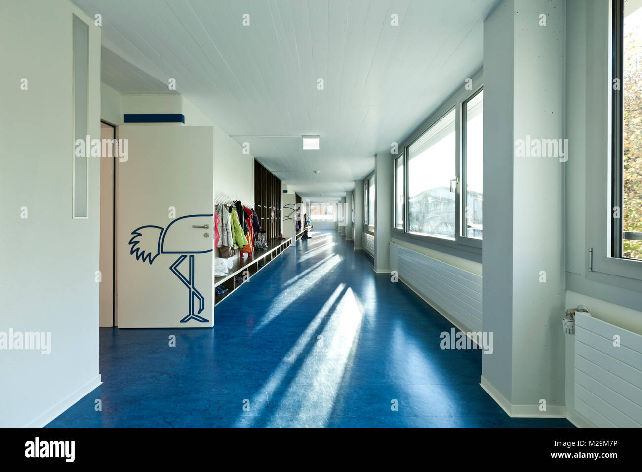 modern public school, corridor blue floor Stock Photo - Alamy