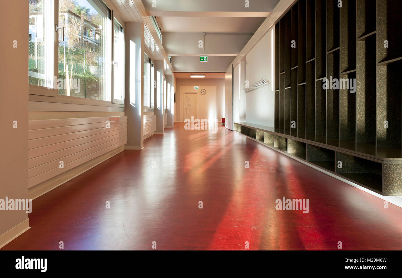 modern public school, corridor red floor Stock Photo - Alamy
