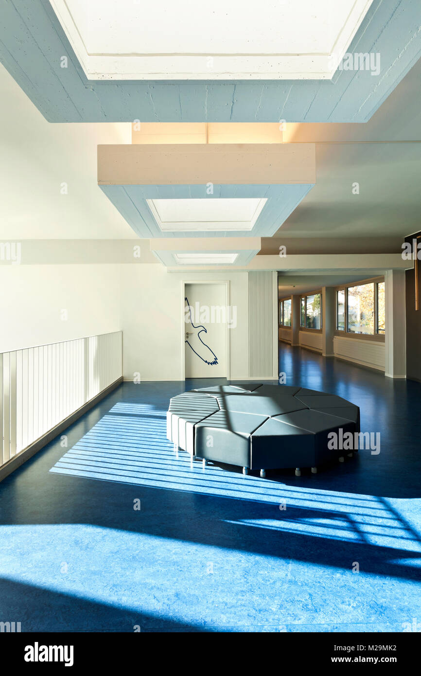 modern public school, hall, blue floor Stock Photo - Alamy