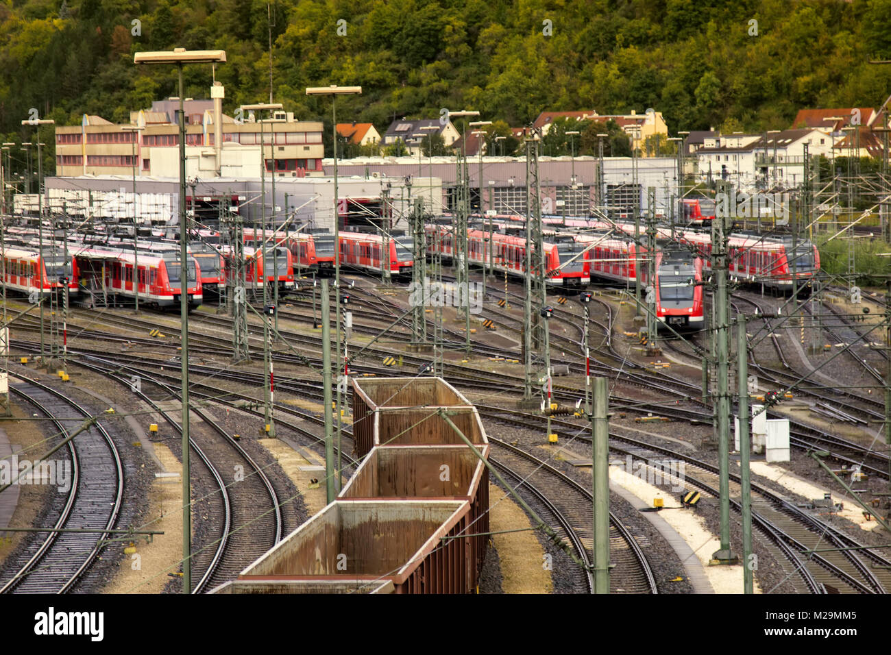 European train depot in the city. passenger trains waiting for ...