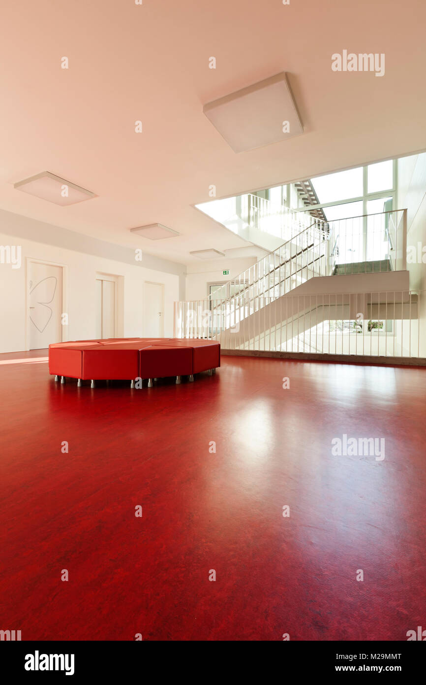 modern public school, hall, red floor Stock Photo - Alamy
