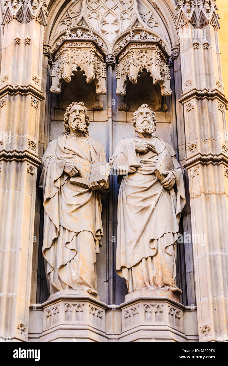 Two Statues on Barcelona Church Stock Photo - Alamy