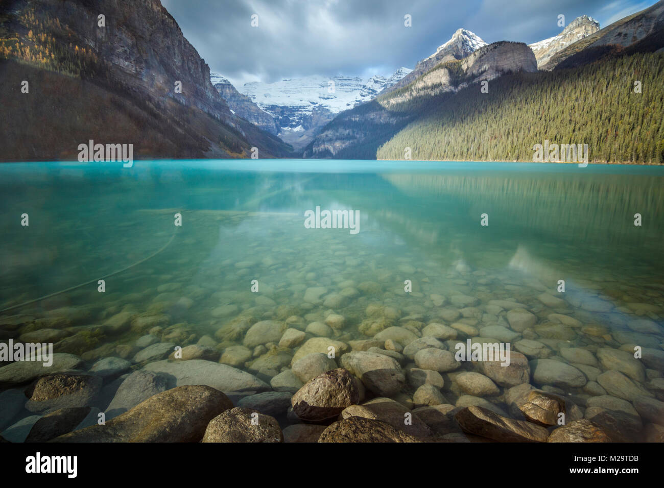 View over and under Lake Louise towards Mountain Victoria, Banff ...