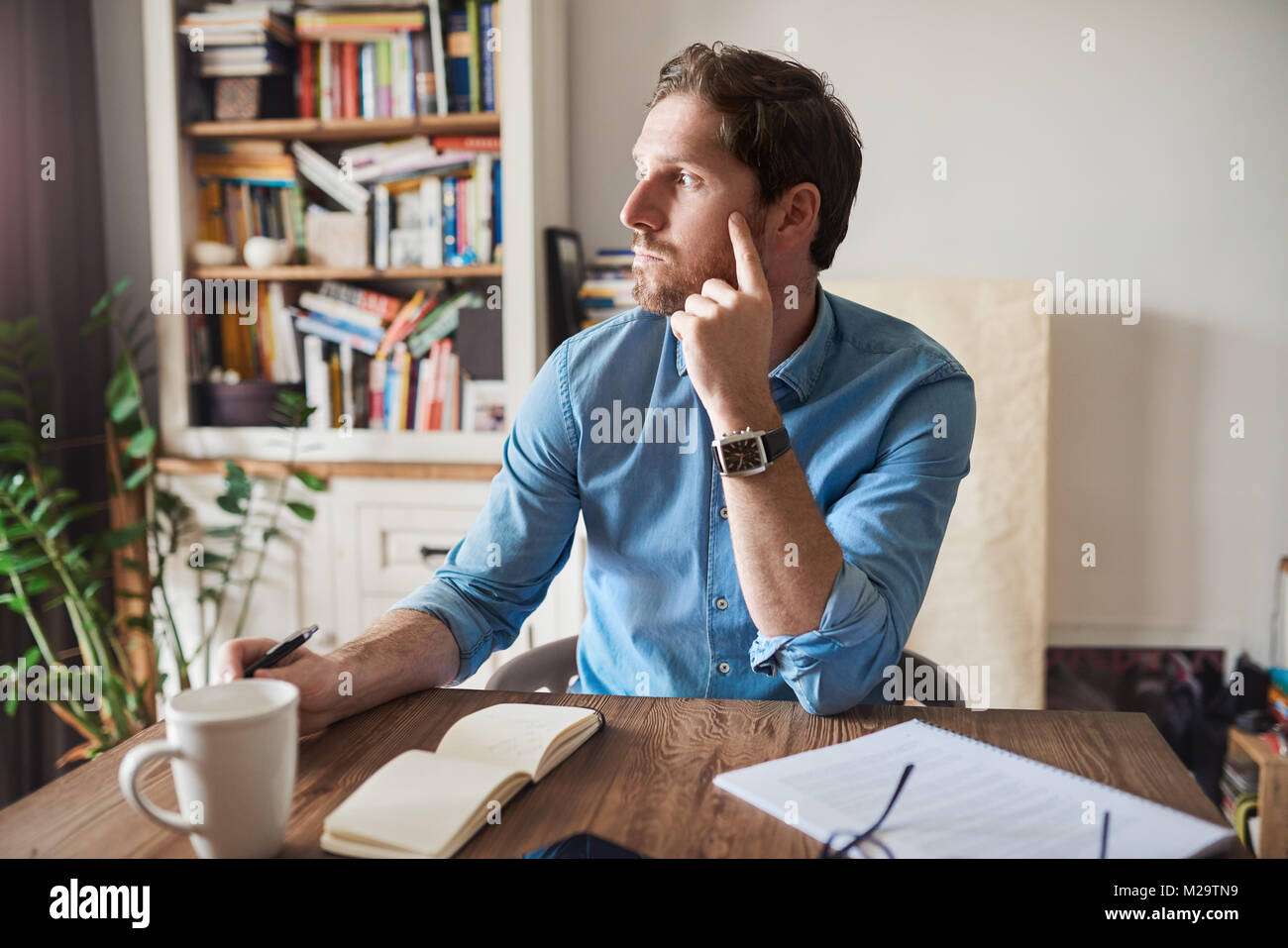 Beard young man thinking writing hi-res stock photography and images ...