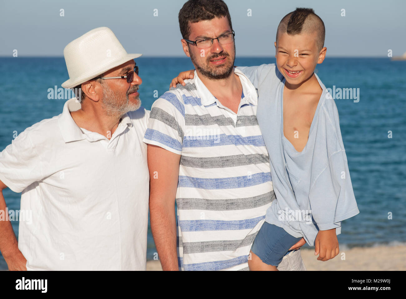 Three generations father son grandson hi-res stock photography and ...
