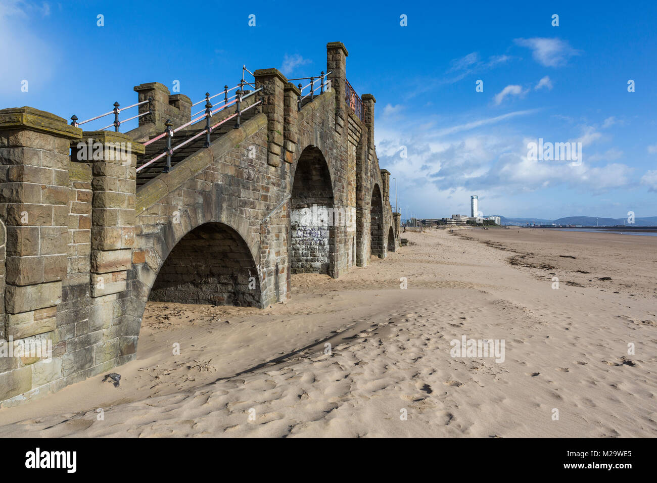 Remains of the Slip Bridge on Swansea beach sea front Stock Photo - Alamy