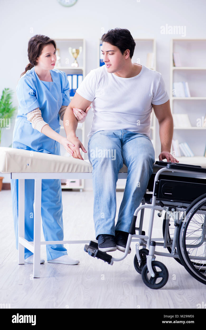 Patient undergoing rehabilitation recovery programme with doctor Stock ...