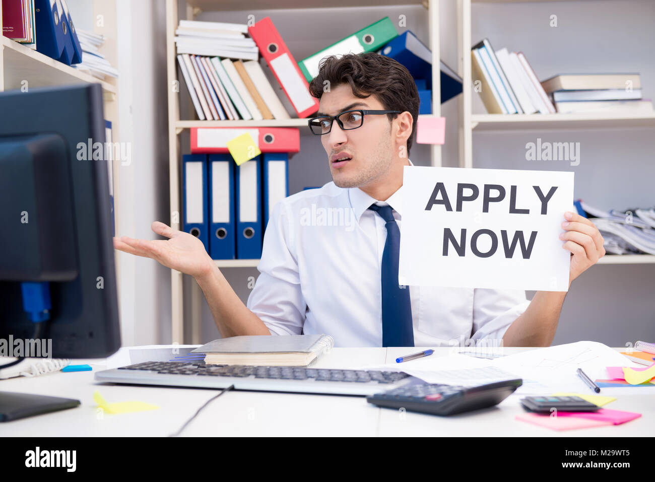 Businessman hiring new employees to cope with increased workload Stock ...