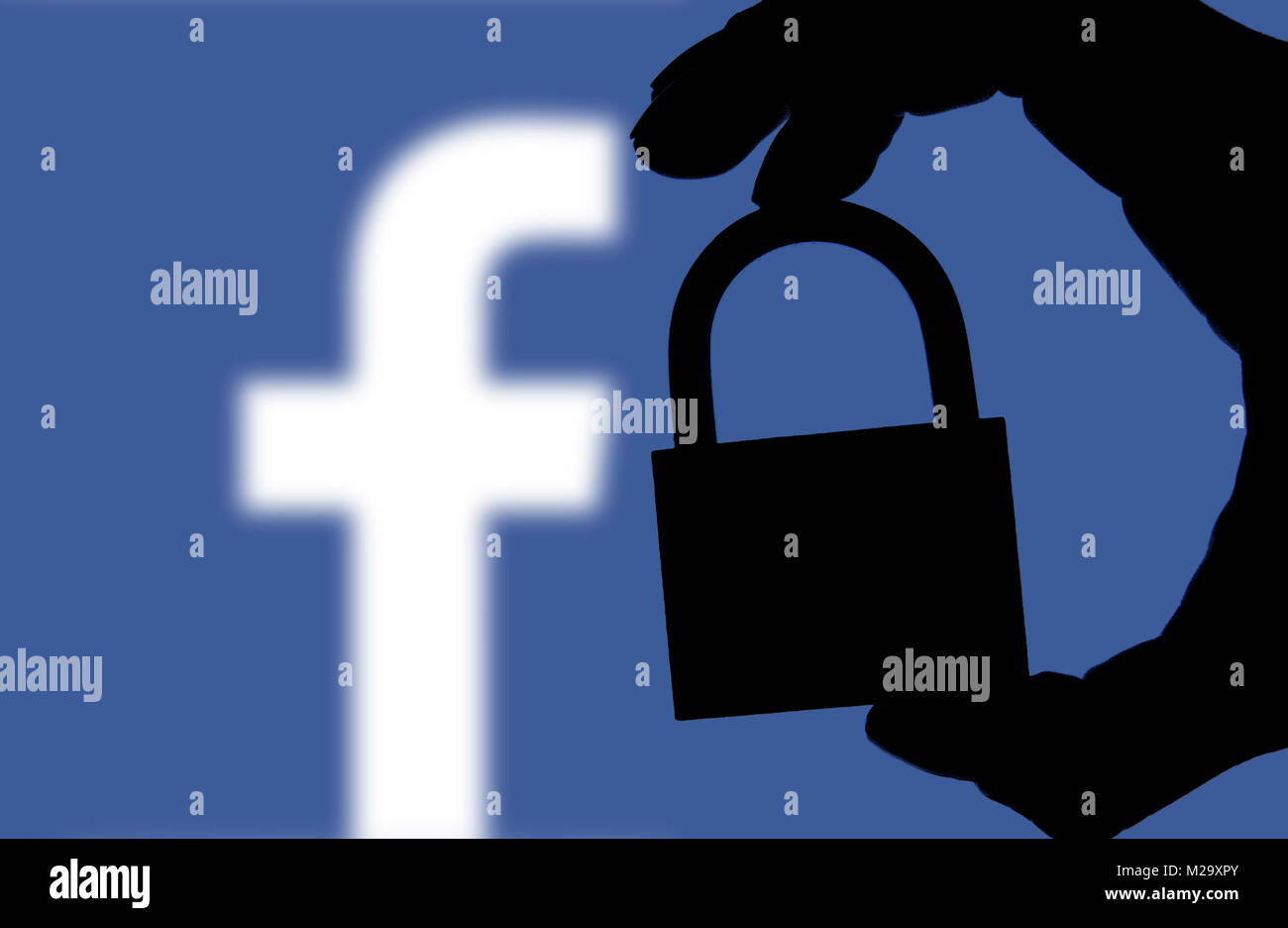 LONDON, UK - FEBRUARY 5th 2018: Facebook security issues. Silhouette of ...
