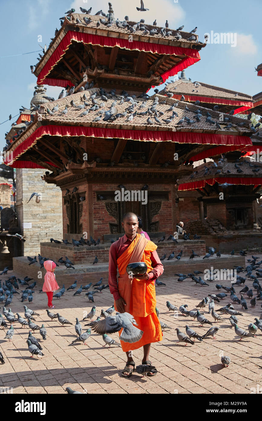 Monk wearing orange robe hi-res stock photography and images - Alamy