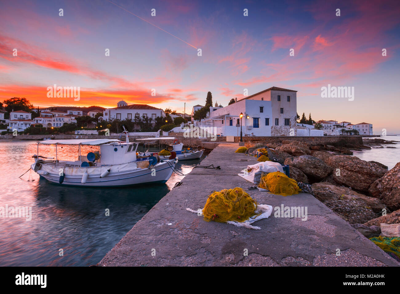 Traditional fishing boats in the harbour of Spetses, Greece Stock Photo ...